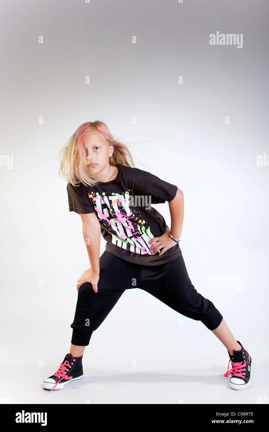 Cool young girl posing Stock Photo - Alamy