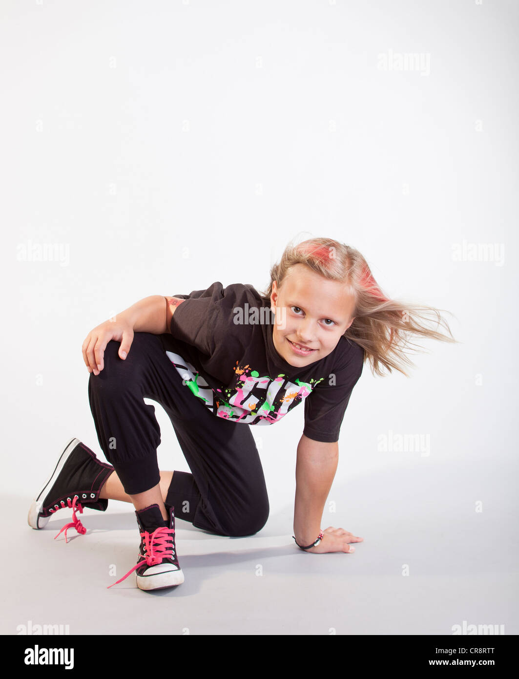 Cool young girl posing Stock Photo - Alamy