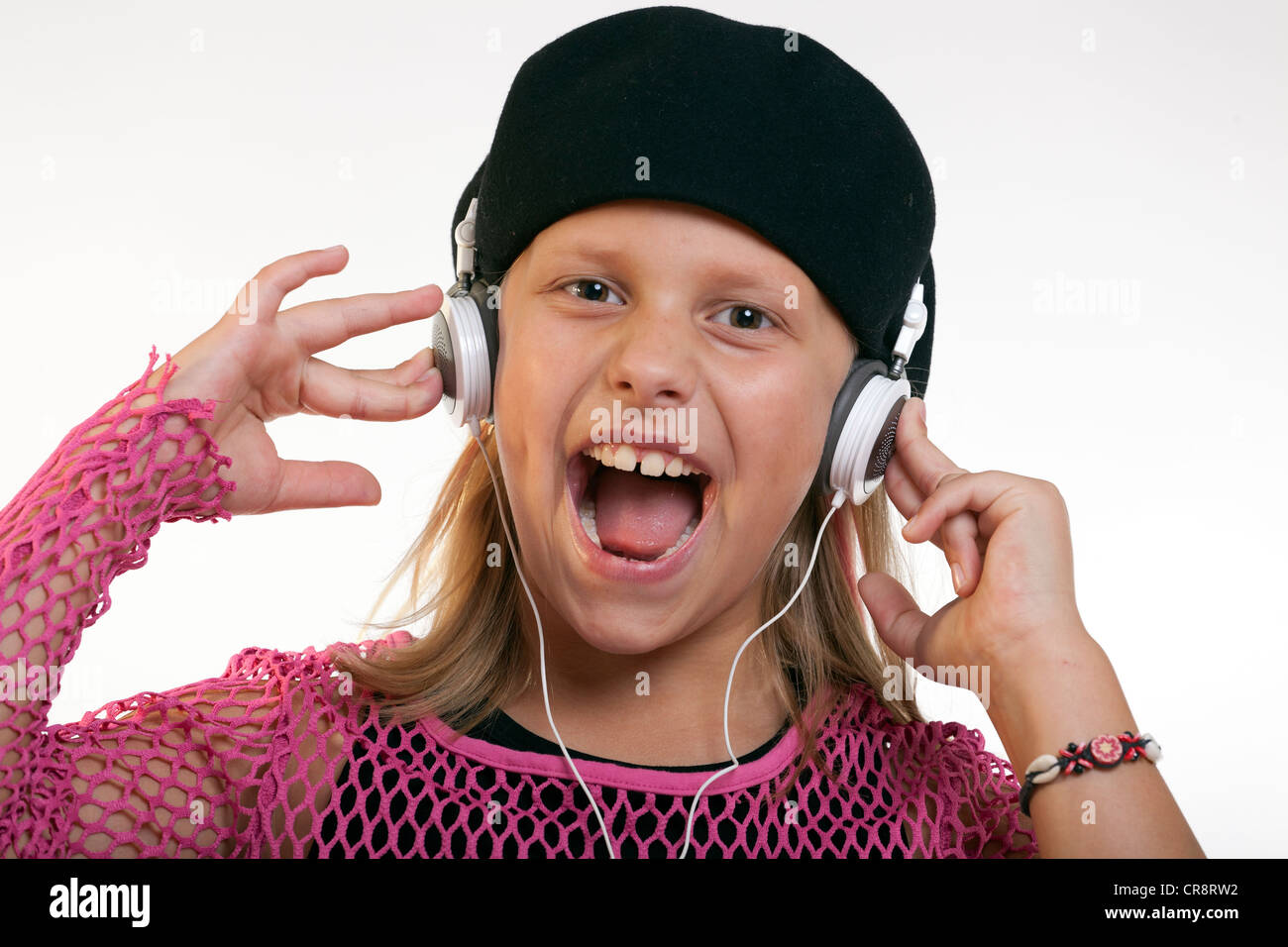 Cool young girl wearing headphones Stock Photo - Alamy