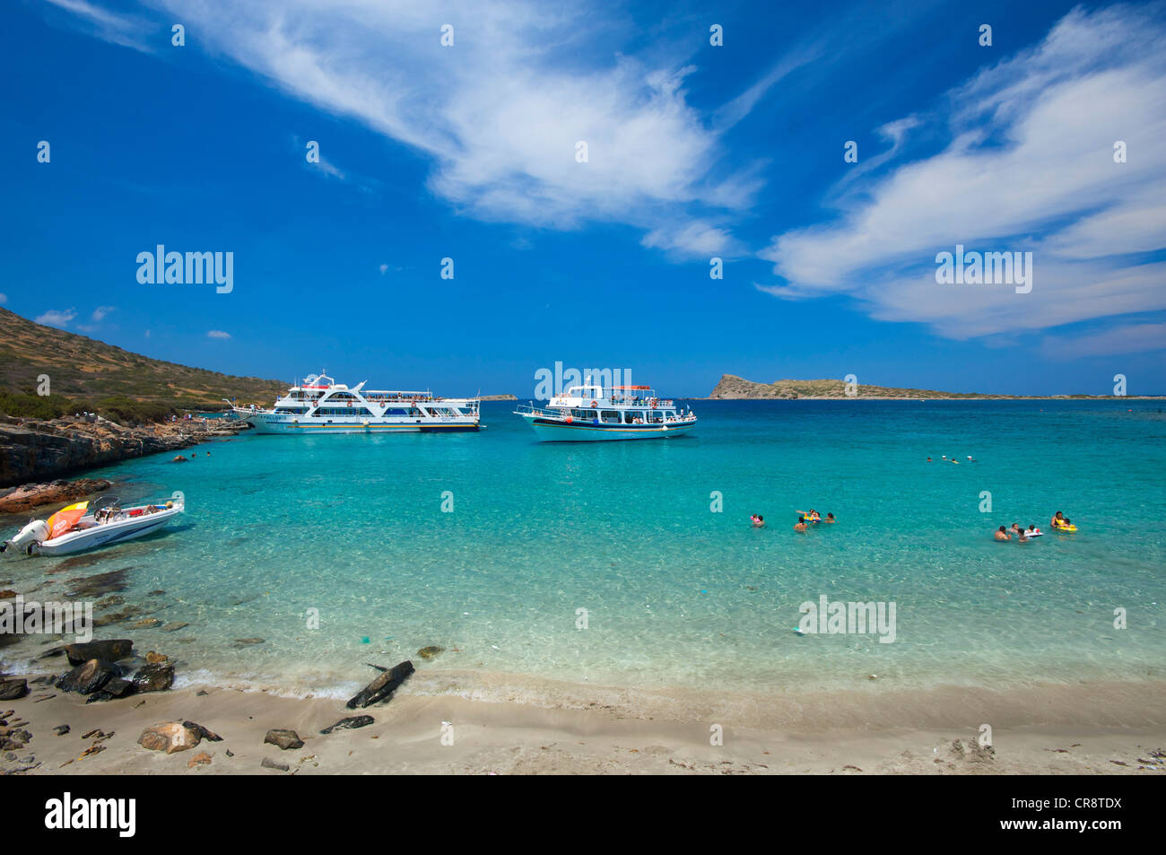 Pleasure boats off Kolokithia beach on Spinalonga, near Elounda, Crete ...