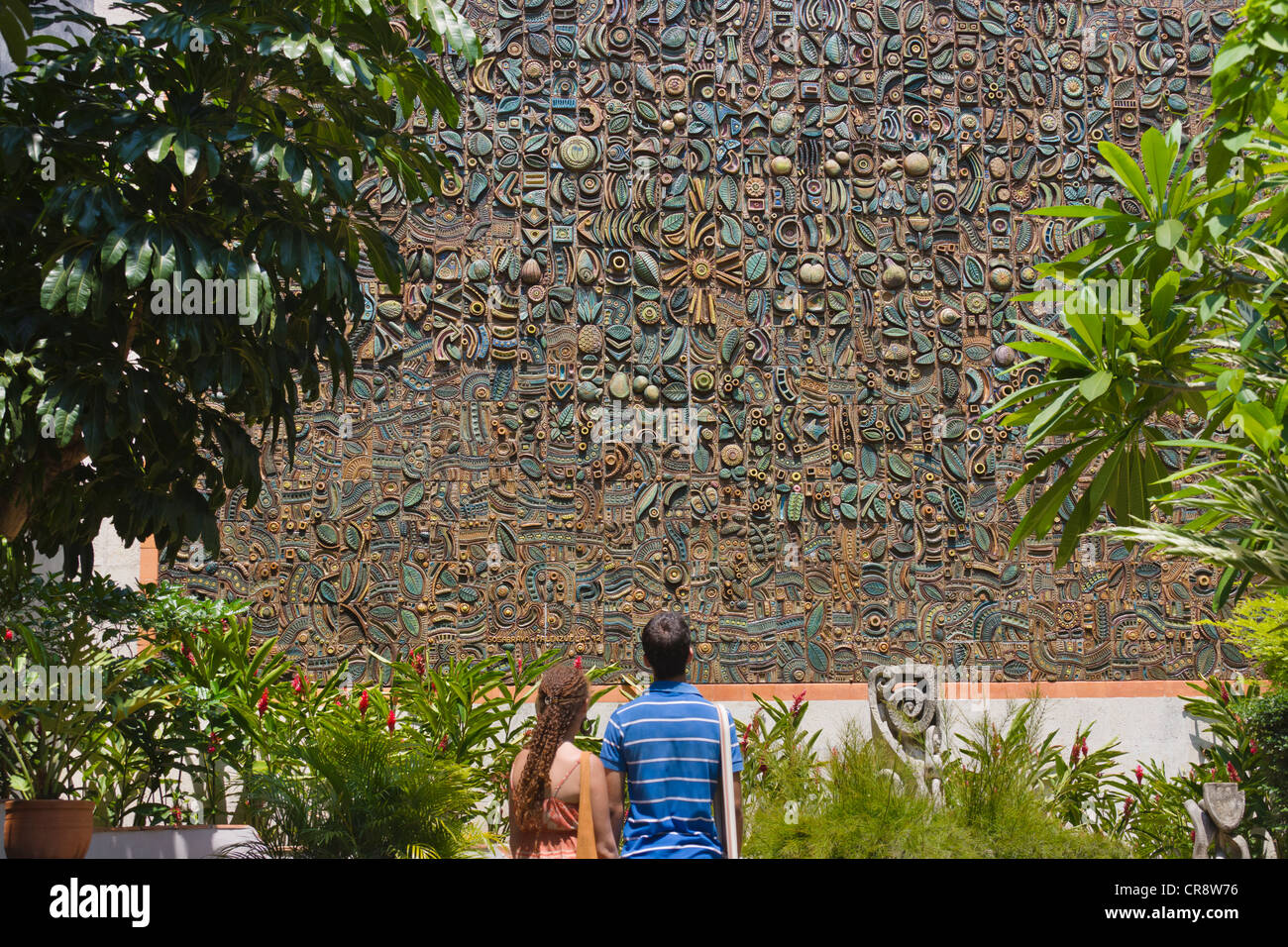 Tourist watch mural in old building in the historic center, Havana ...