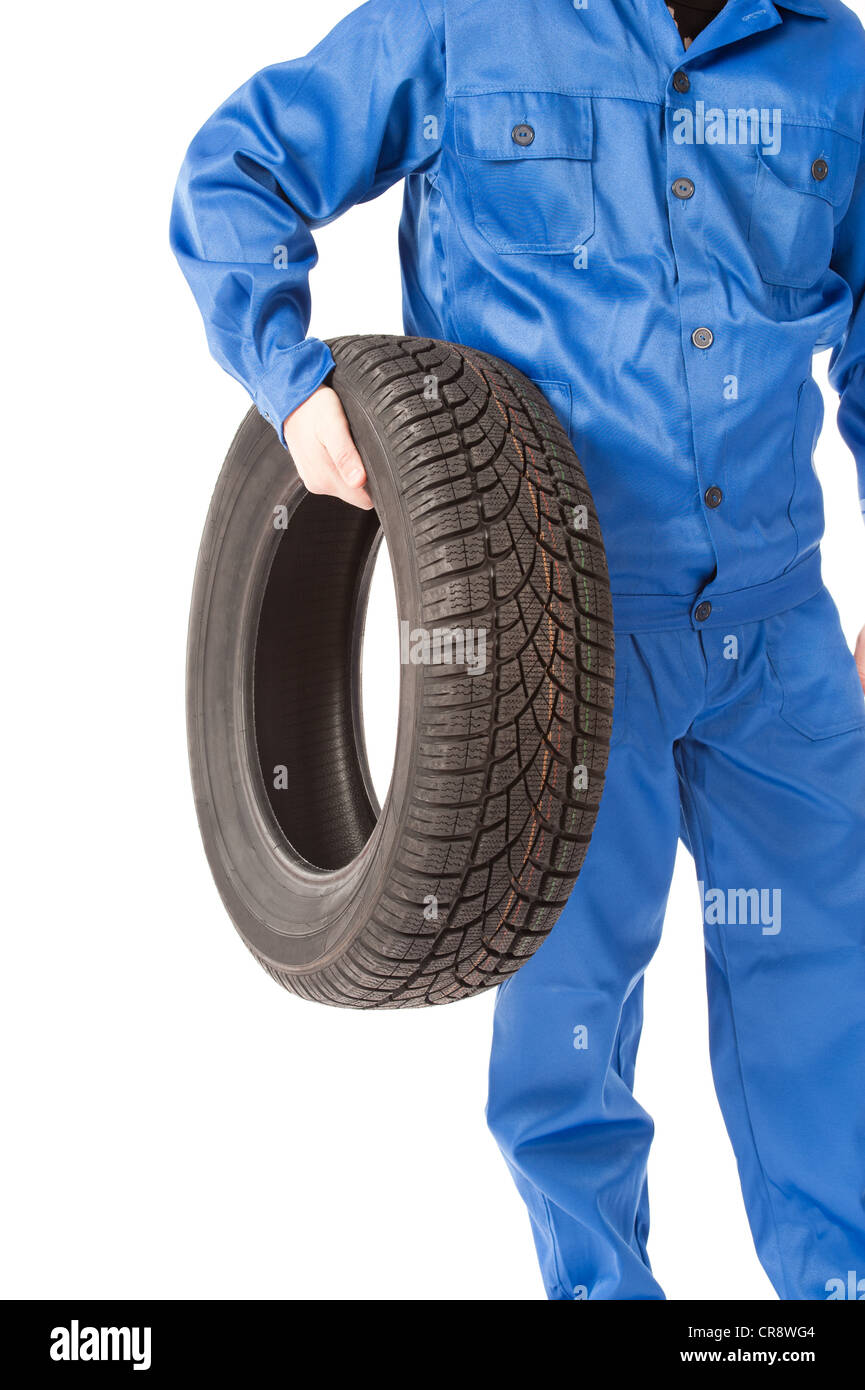 Mechanic changing car tire in hi-res stock photography and images - Alamy