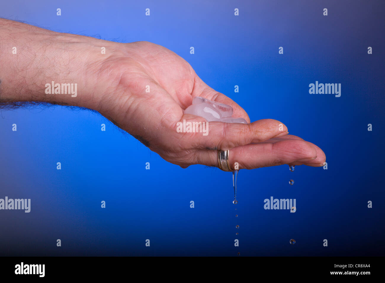 Melting ice cube hand hi-res stock photography and images - Alamy Melting ice cube hand hi-res stock photography and images - Alamy