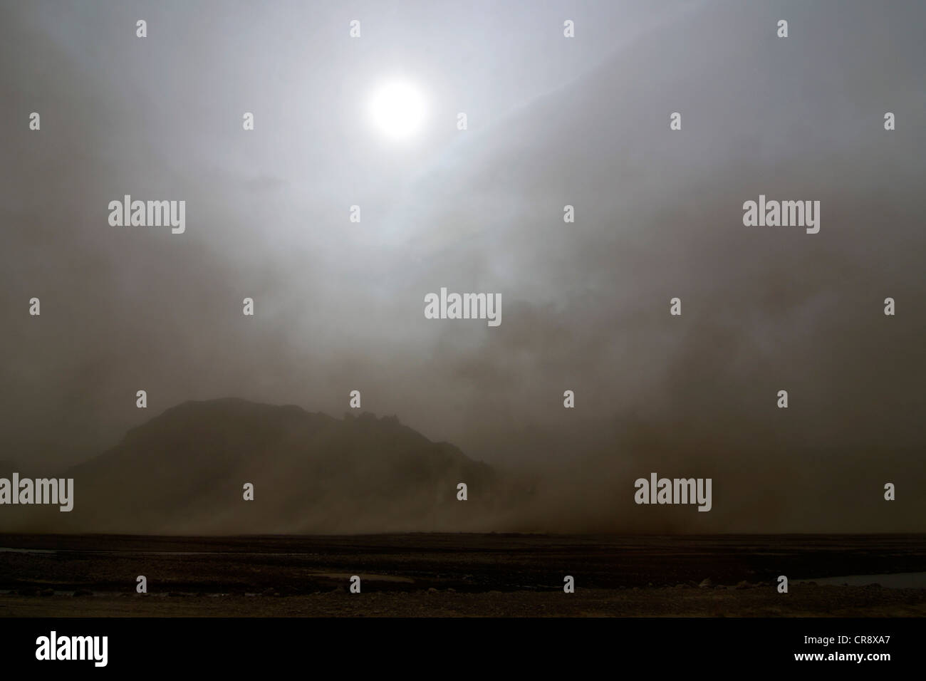 Sunshine diffused through the wind swirled ash, which fell during the ...