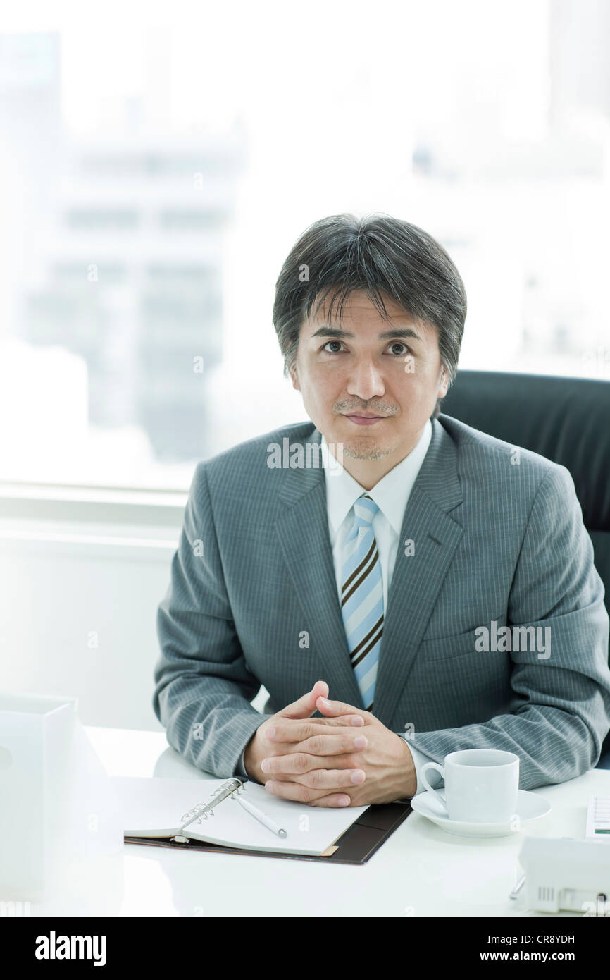 A businessman in the office Stock Photo - Alamy
