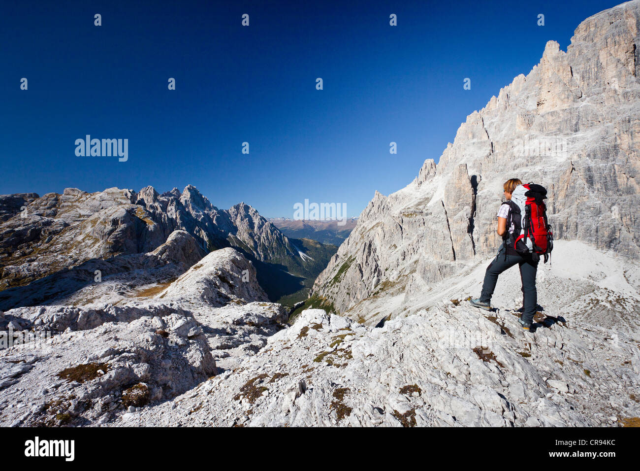Climber at the Strada degli Alpini via ferrata, view of Mt Cima Una, Mt ...