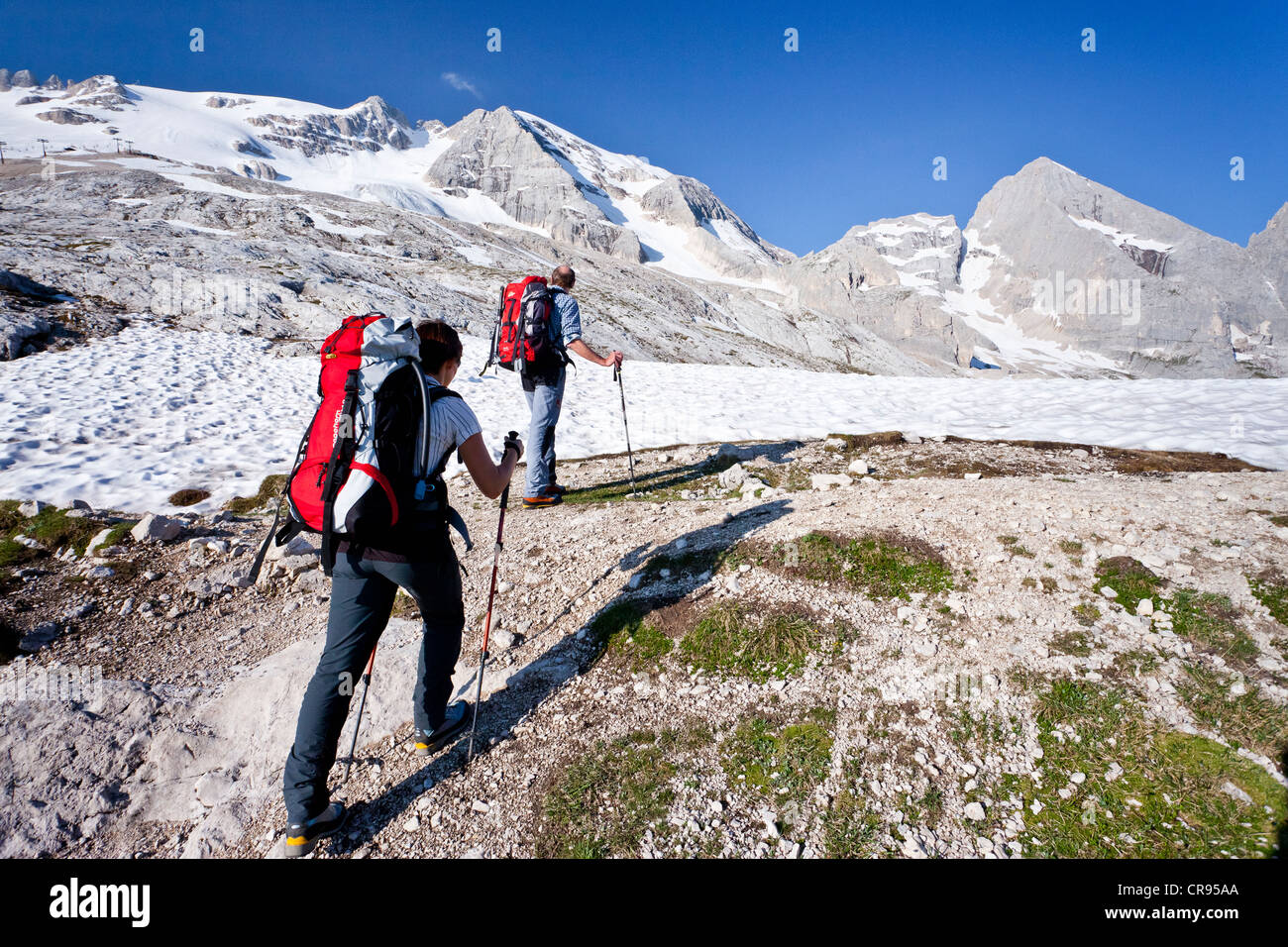 Mountaineers climbing Marmolada mountain, Dolomites, Westgrat fixed ...