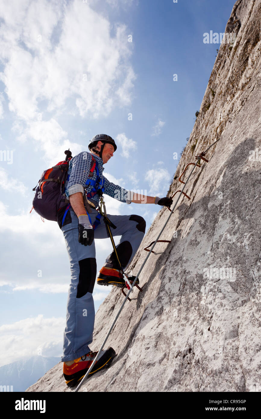 Climber on the Che Guevara fixed rope route on Mt. Monte Casale in the ...