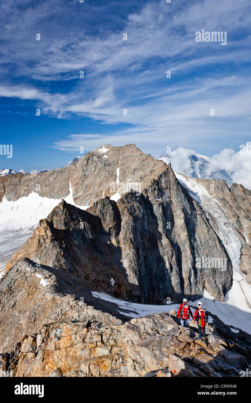 Hikers climbing Mt Angelo Grande in the Ortler mountain range, Mt ...
