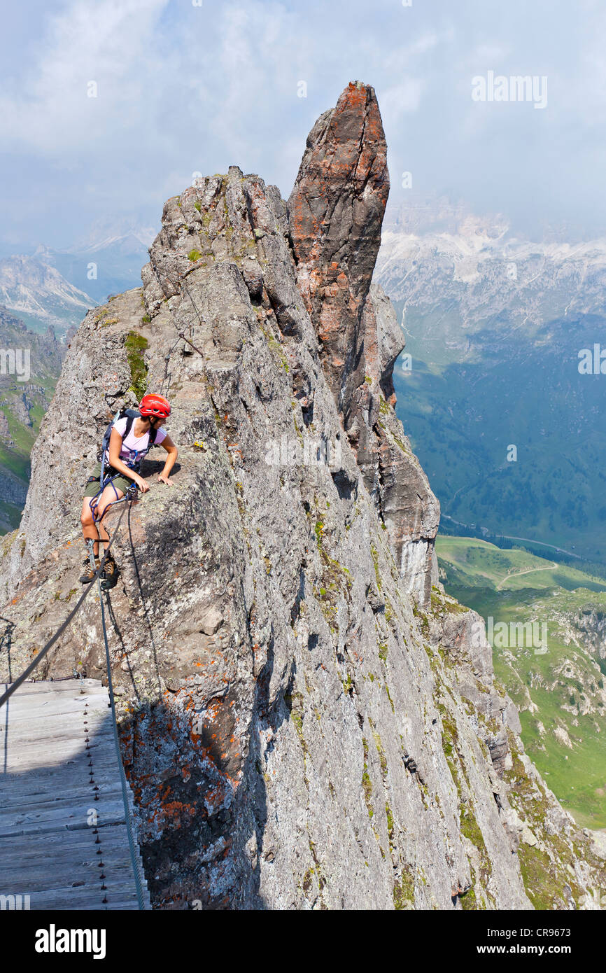 Climber ascending the via ferrata climbing route of the Tofane ...