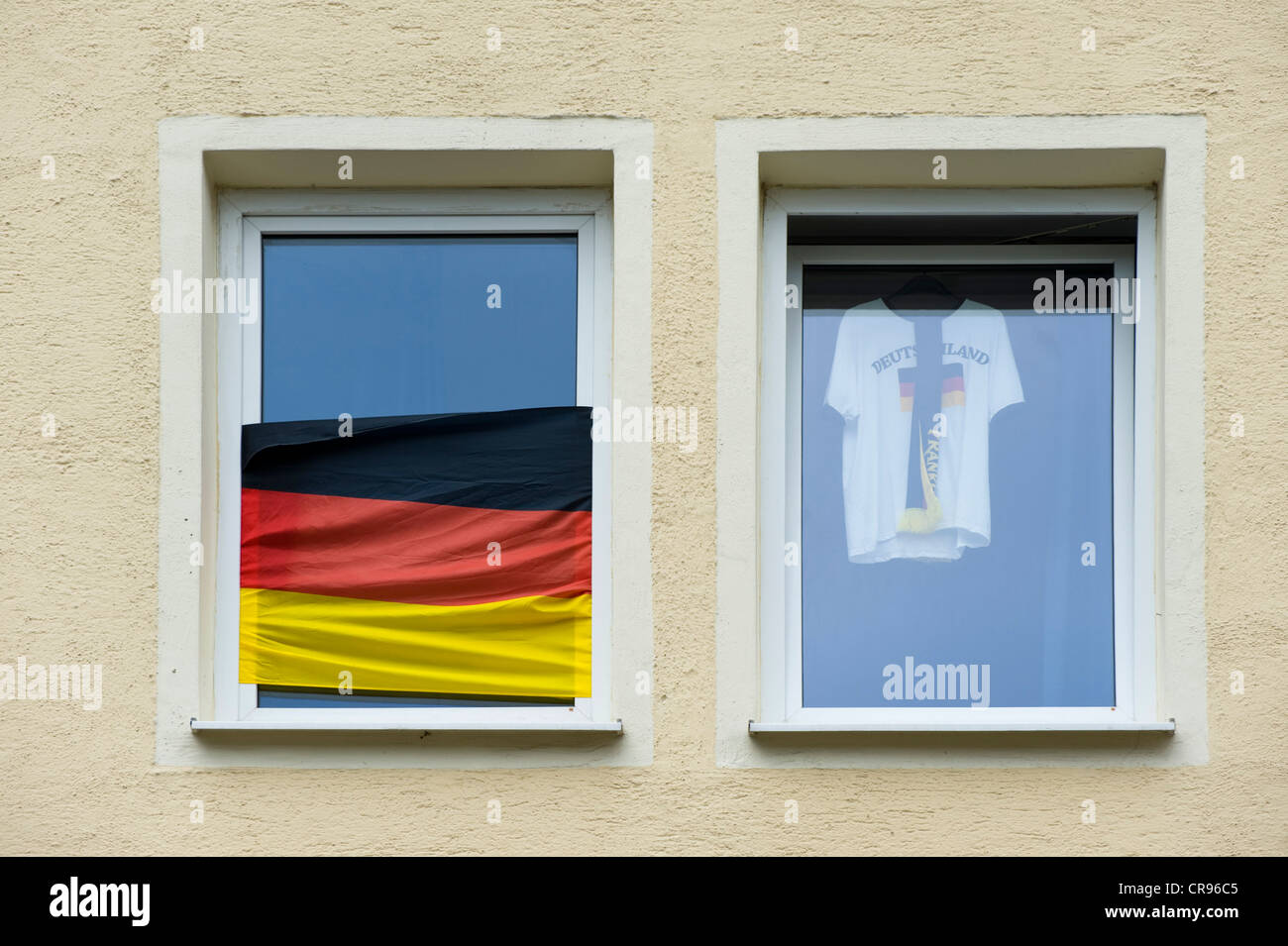 Window of a soccer fan with a German flag and a jersey of the German ...