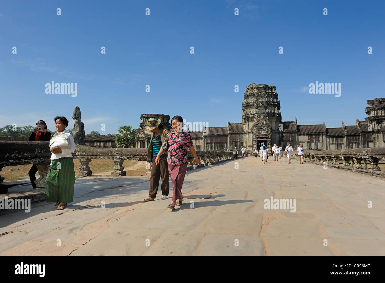 Khmer people return from a sightseeing tour of Angkor Wat, Cambodia ...