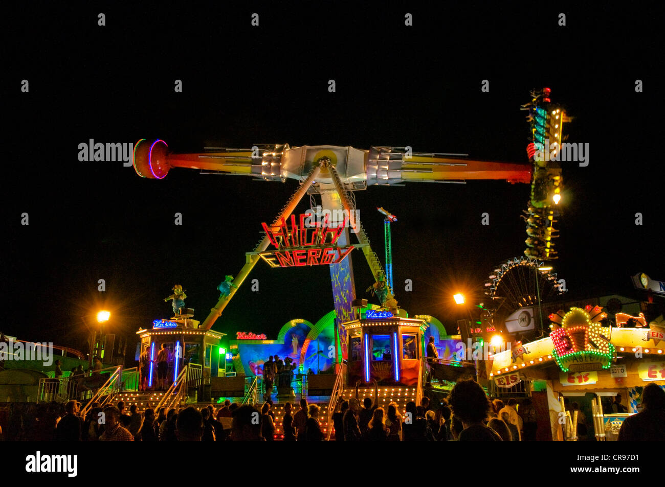 Oktoberfest, Wiesn, amusement rides, giant rotating pendulum at night ...