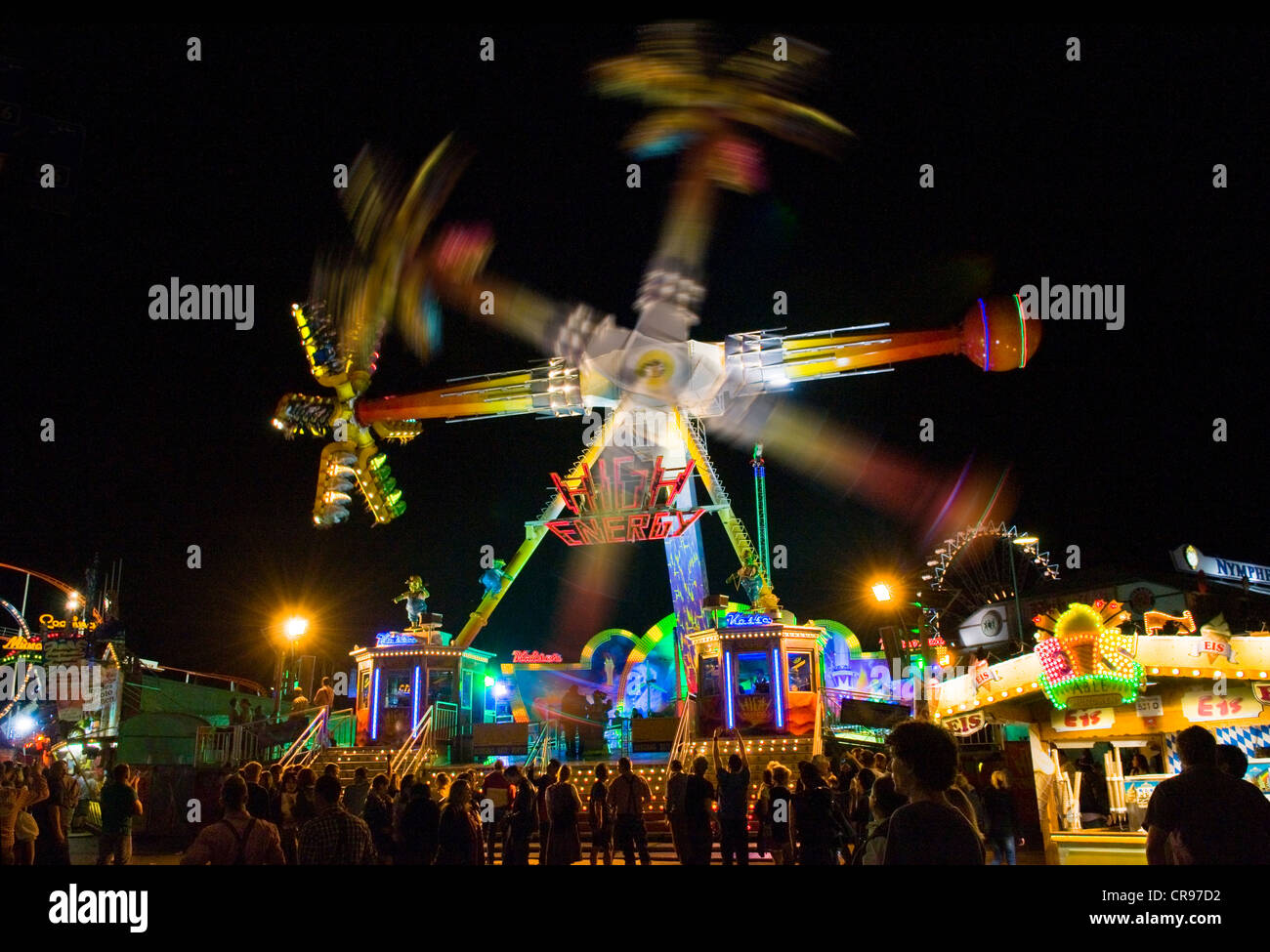 Oktoberfest, Wiesn, amusement rides, giant rotating pendulum at night ...