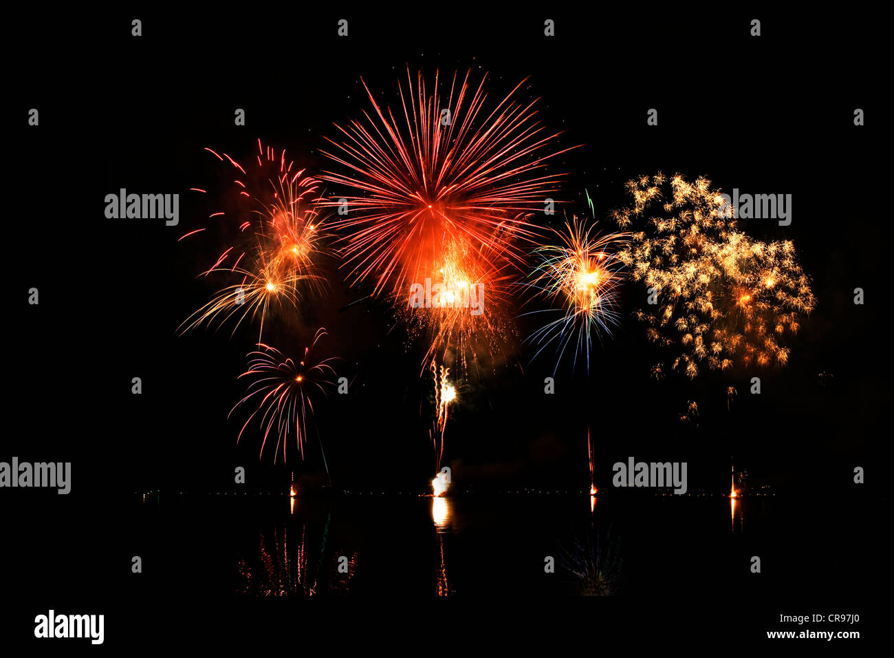 Aerial fireworks display on the lake, quadruple mushroom clouds with ...