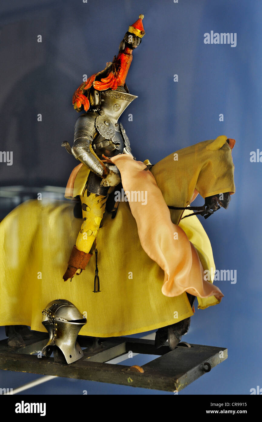 Tournament knight wearing jousting armour with a heraldic crest on the ...
