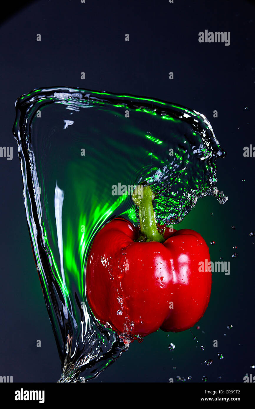Green bell pepper splashing in water hi-res stock photography and ...
