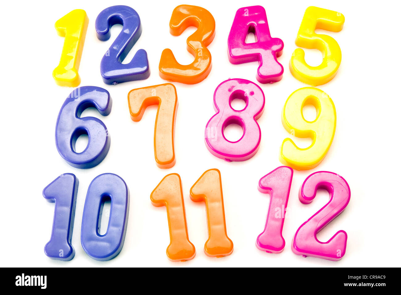 plastic color numbers isolated on white background Stock Photo - Alamy