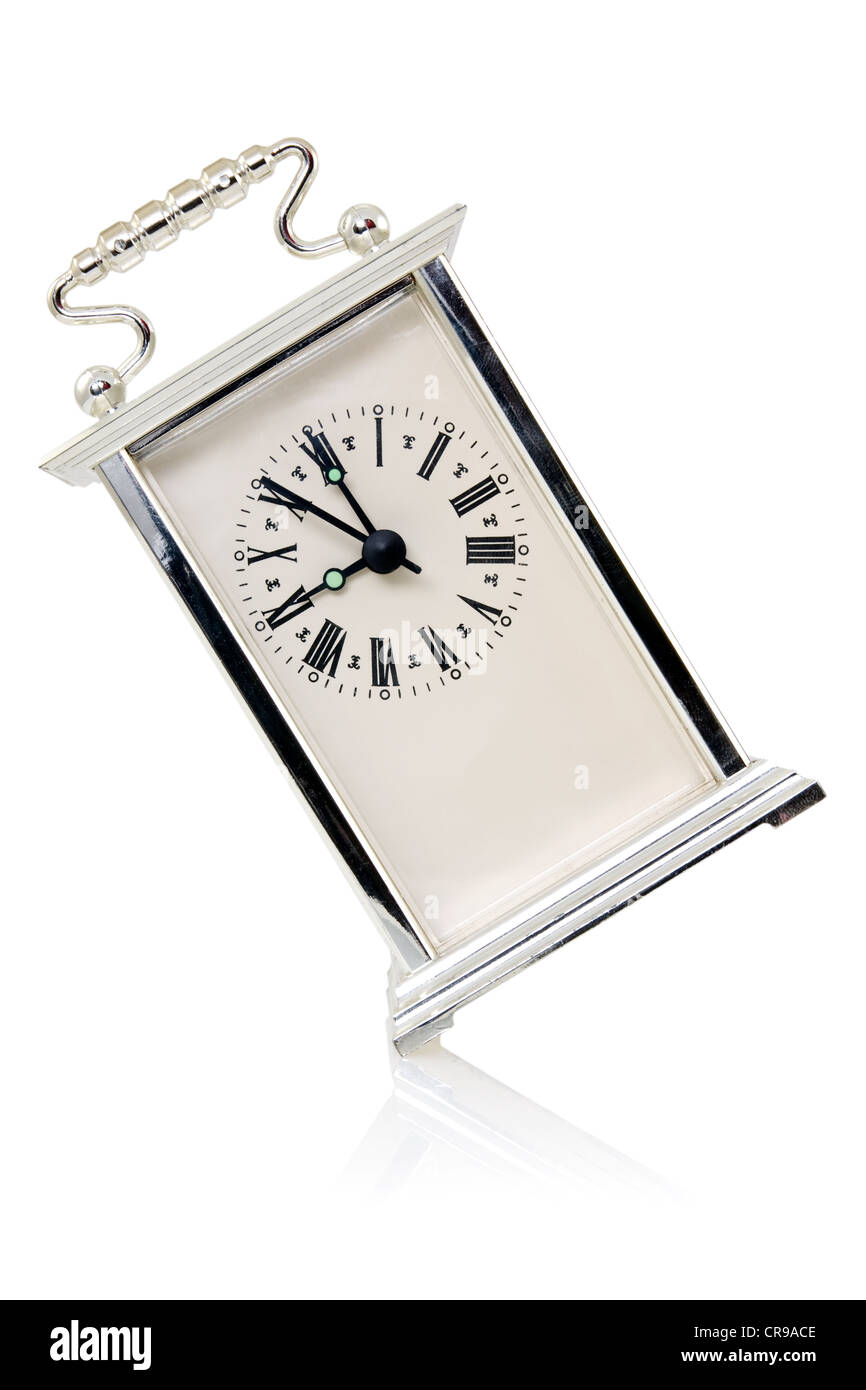 old analogue clock show nine o'clock over a white background Stock ...