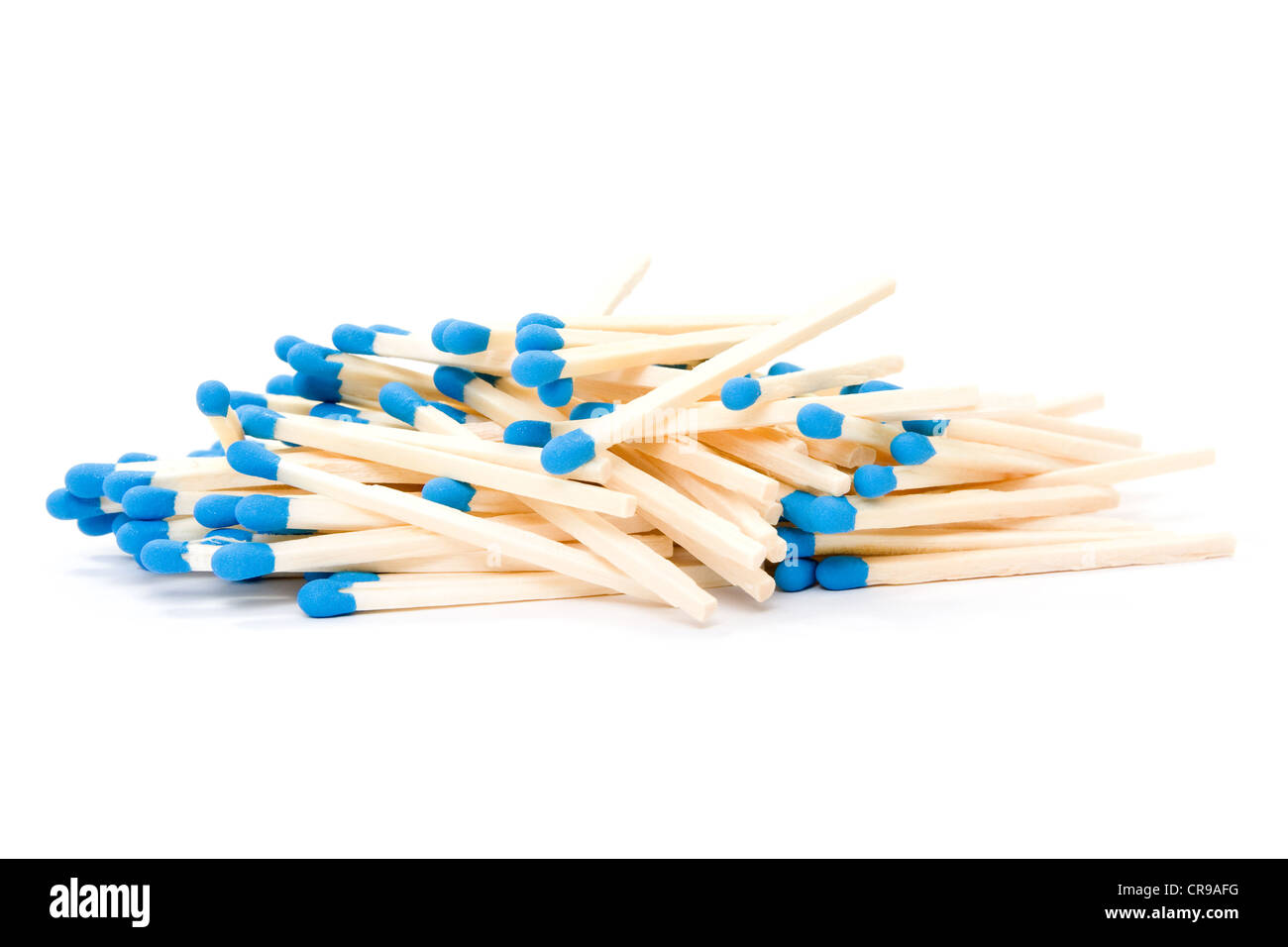 Pile of matches over a white background Stock Photo - Alamy