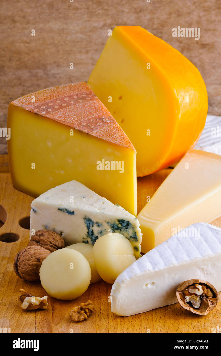 Still life composition with cheese platter Stock Photo - Alamy