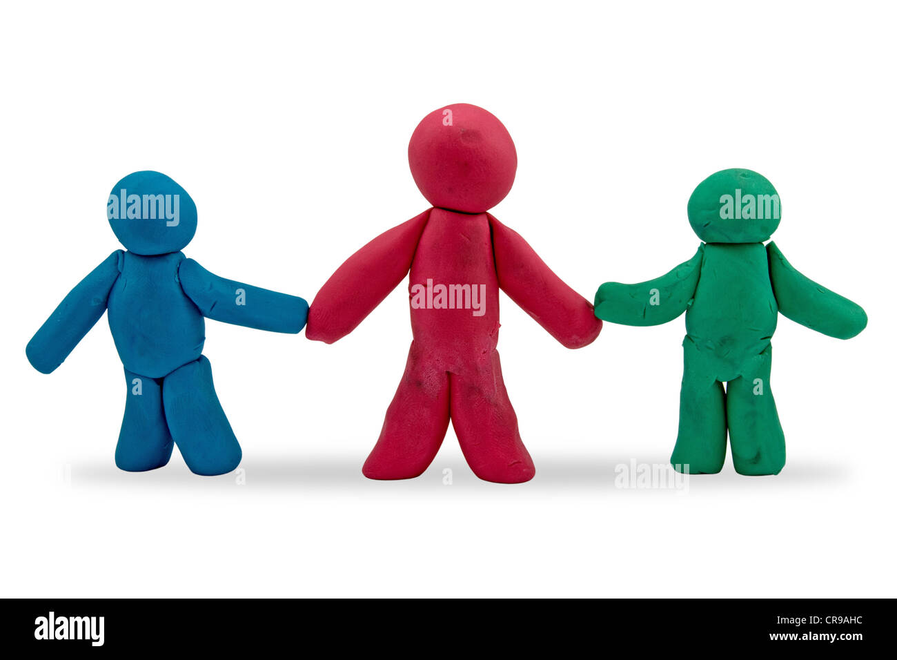 three plasticine persons over a white background Stock Photo - Alamy