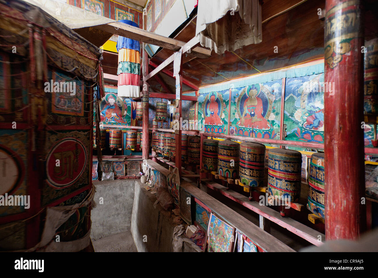 Tibetan Prayer Wheels. Large wooden decorated painted wheels in the ...