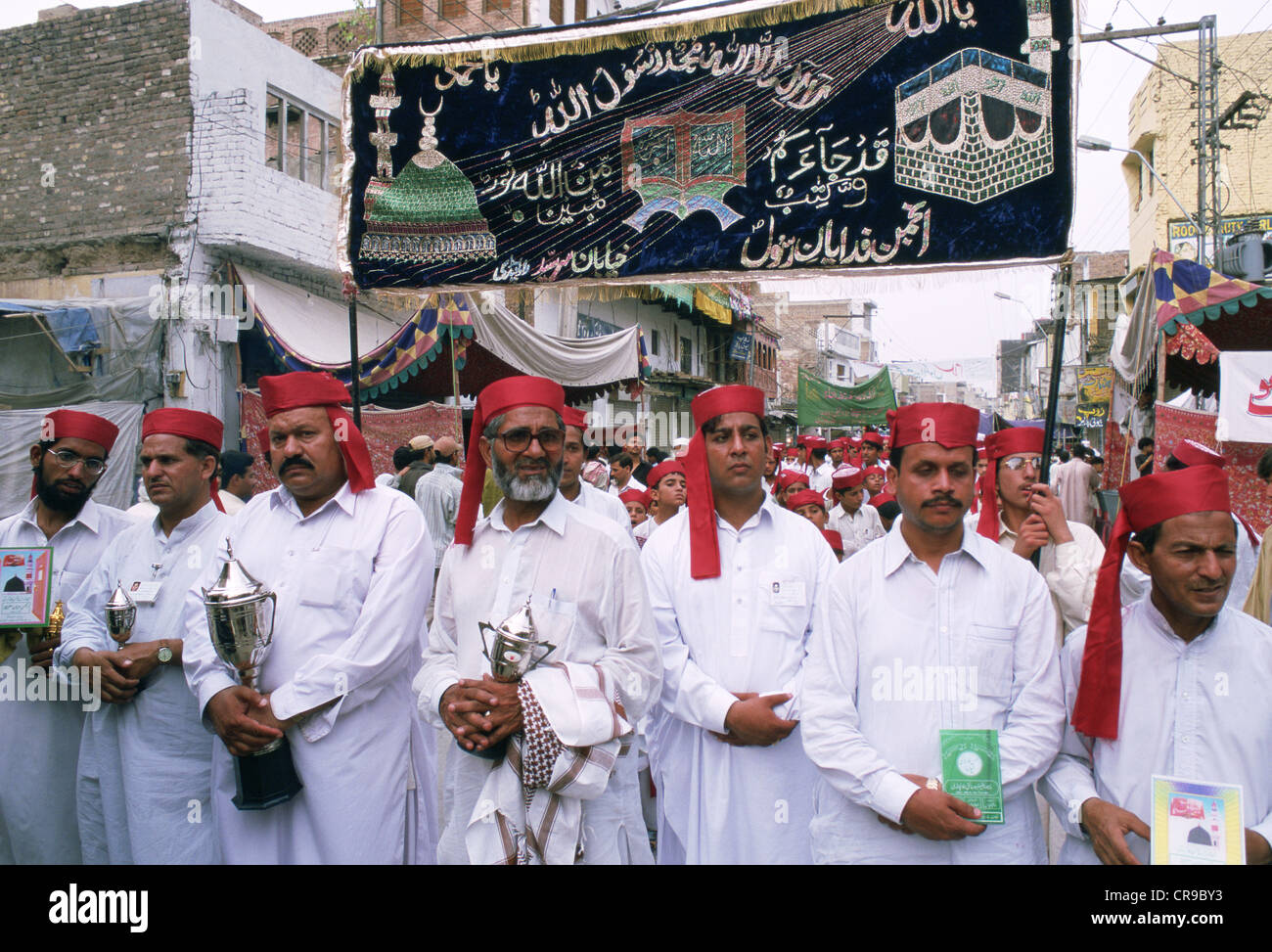 Muslim men participating at a religious procession ( Pakistan Stock ...