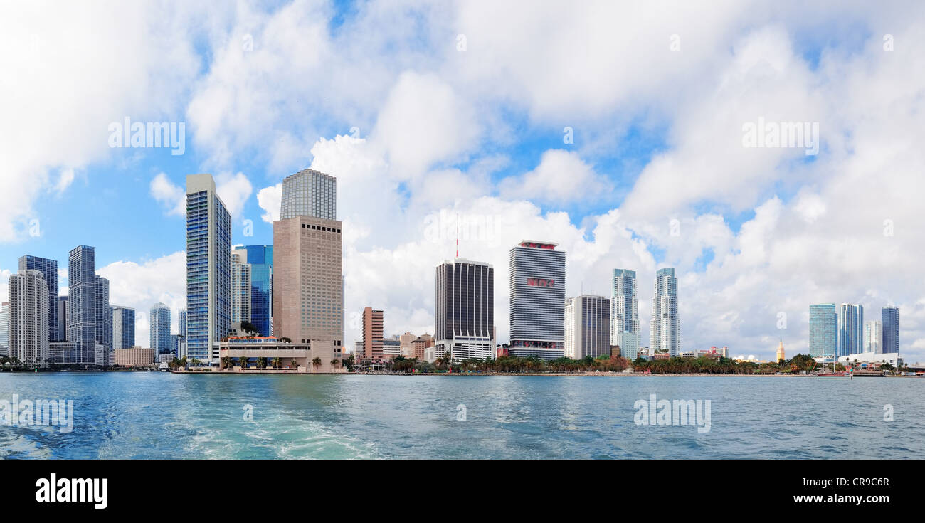 Miami skyline panorama in the day with urban skyscrapers and cloudy sky ...