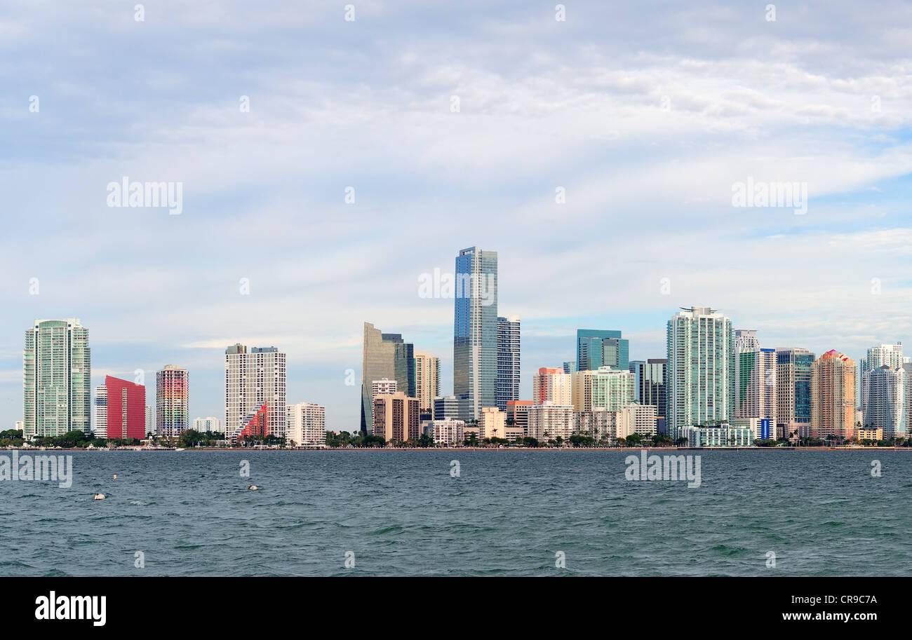 Miami skyline panorama in the day with urban skyscrapers and cloudy sky ...