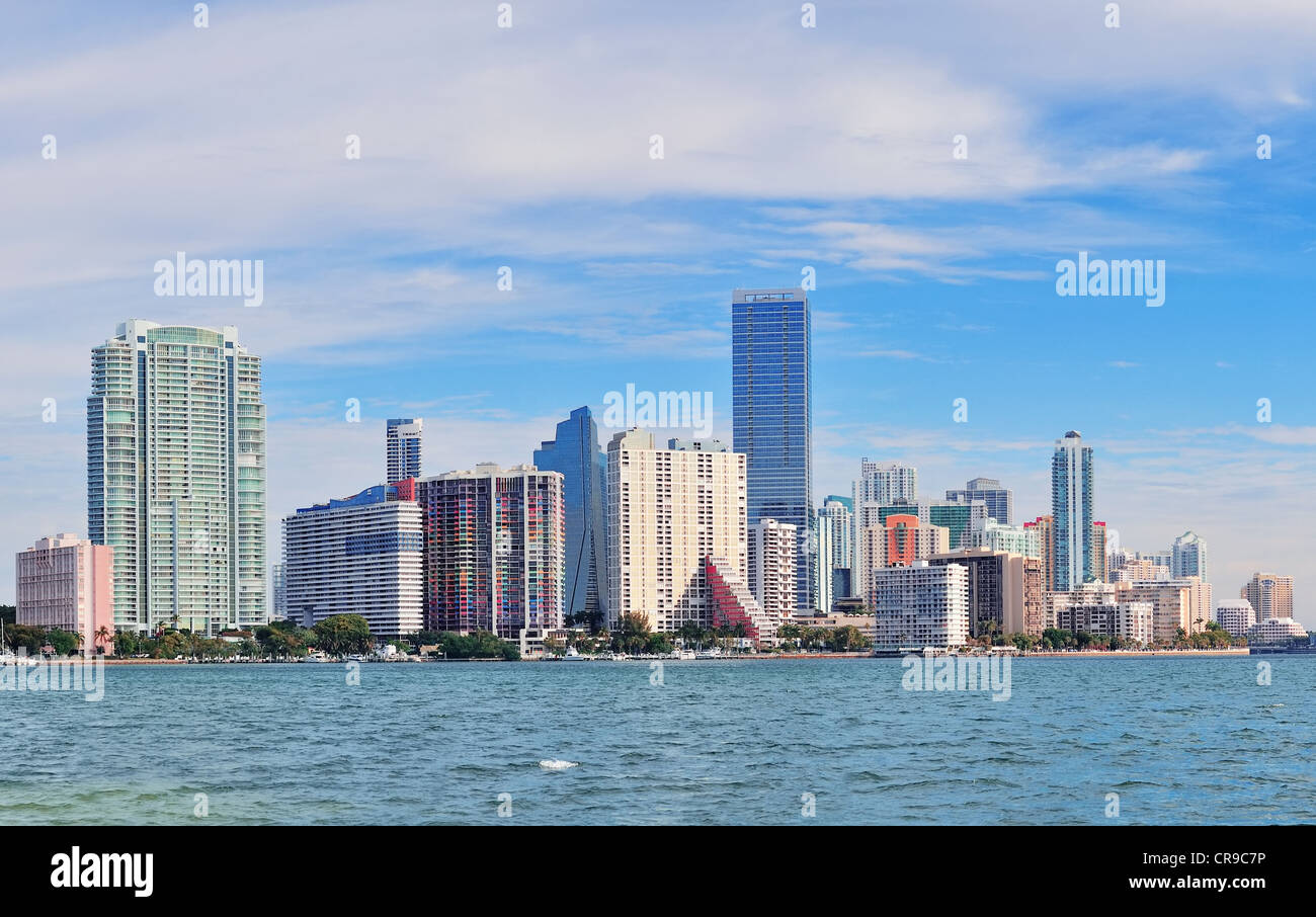 Miami skyline panorama in the day with urban skyscrapers and cloudy sky ...