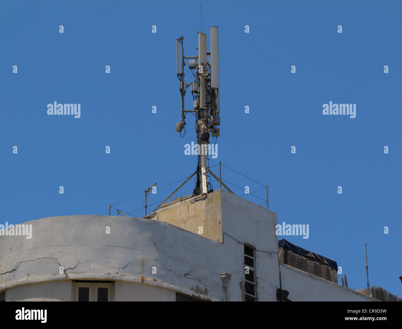 A cellular phone antenna tower on a residential building in Tel Aviv ...