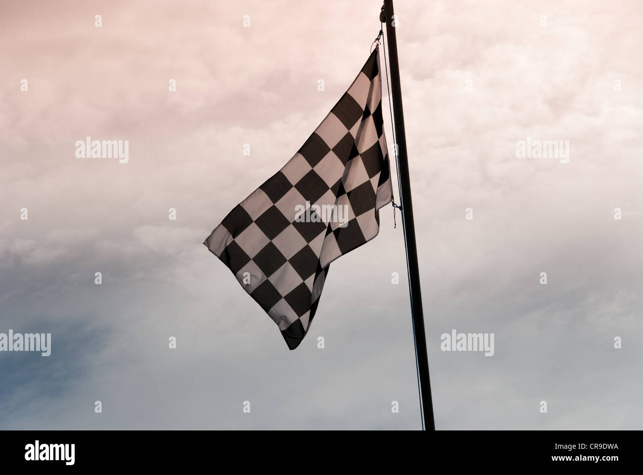 checkered flag with clouds and sky, Cornwall Stock Photo - Alamy