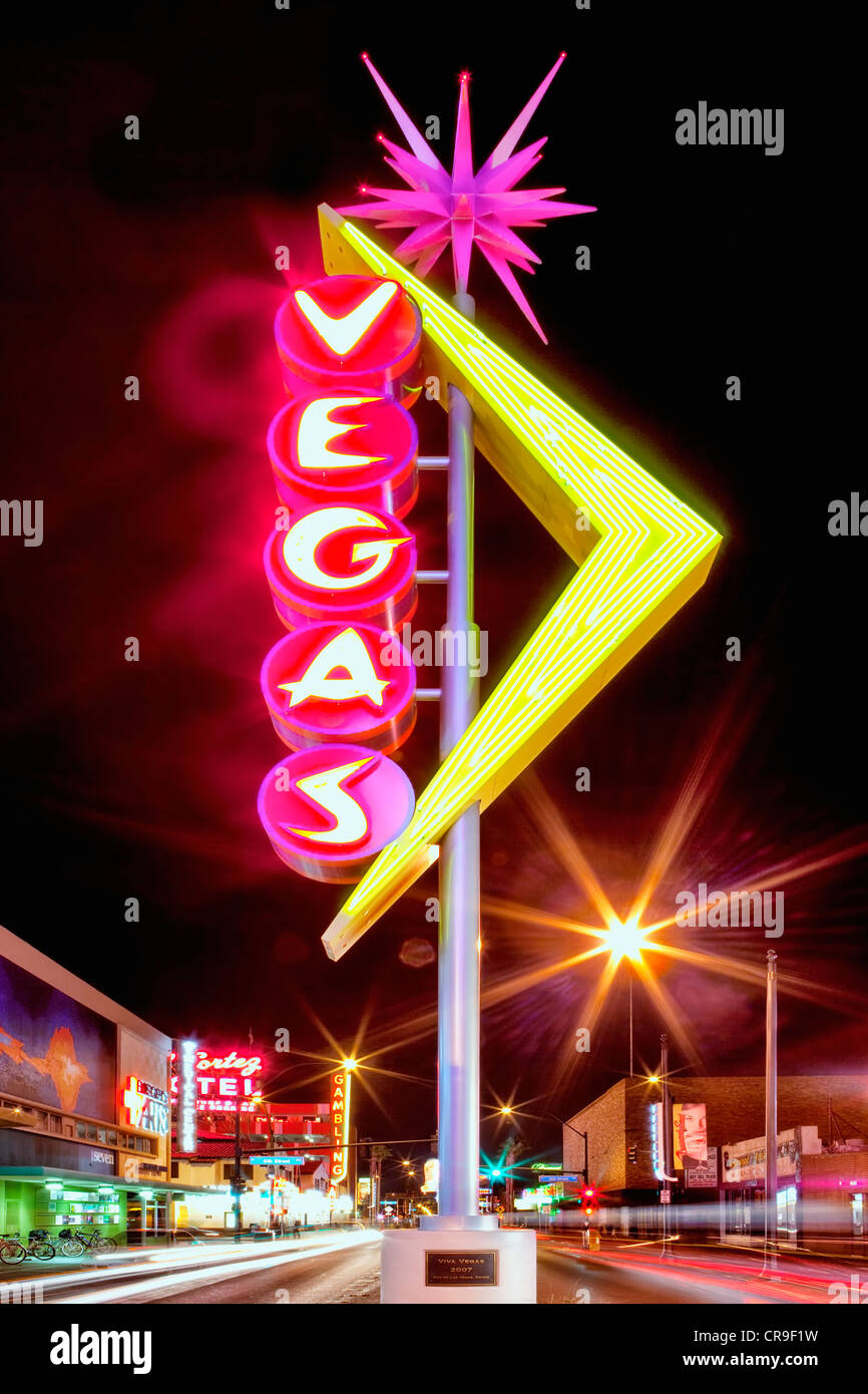 Neon Vegas sign at night on Freemont Street. A city street in the ...