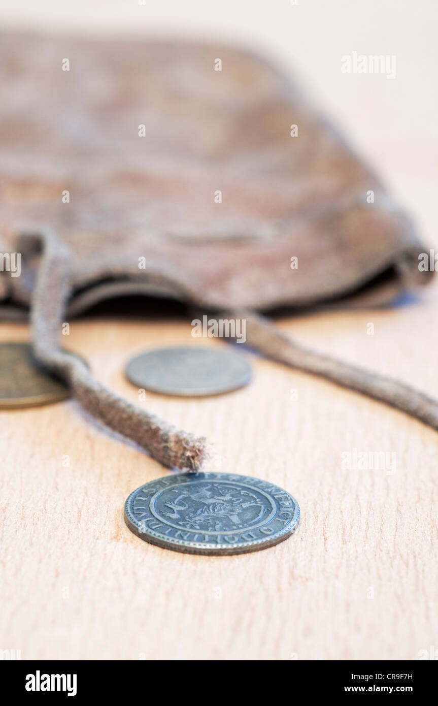 old money bag and antique coins Stock Photo - Alamy