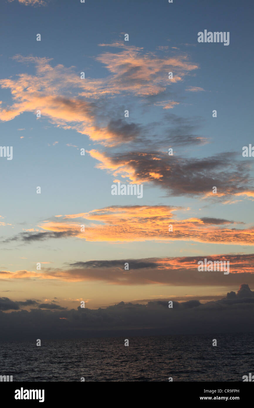 Sunset off Isabela island Galapagos Ecuador Stock Photo - Alamy