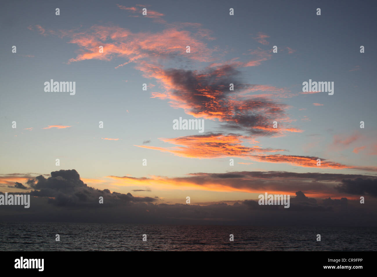 Sunset off Isabela Island Galapagos Ecuador Stock Photo - Alamy