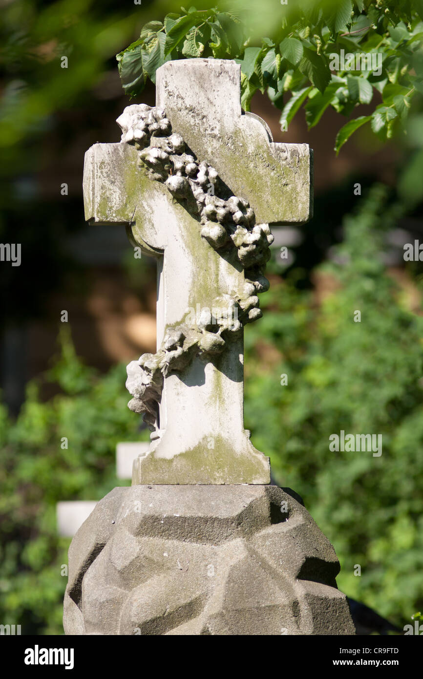 A stone cross on an old tomb Stock Photo - Alamy