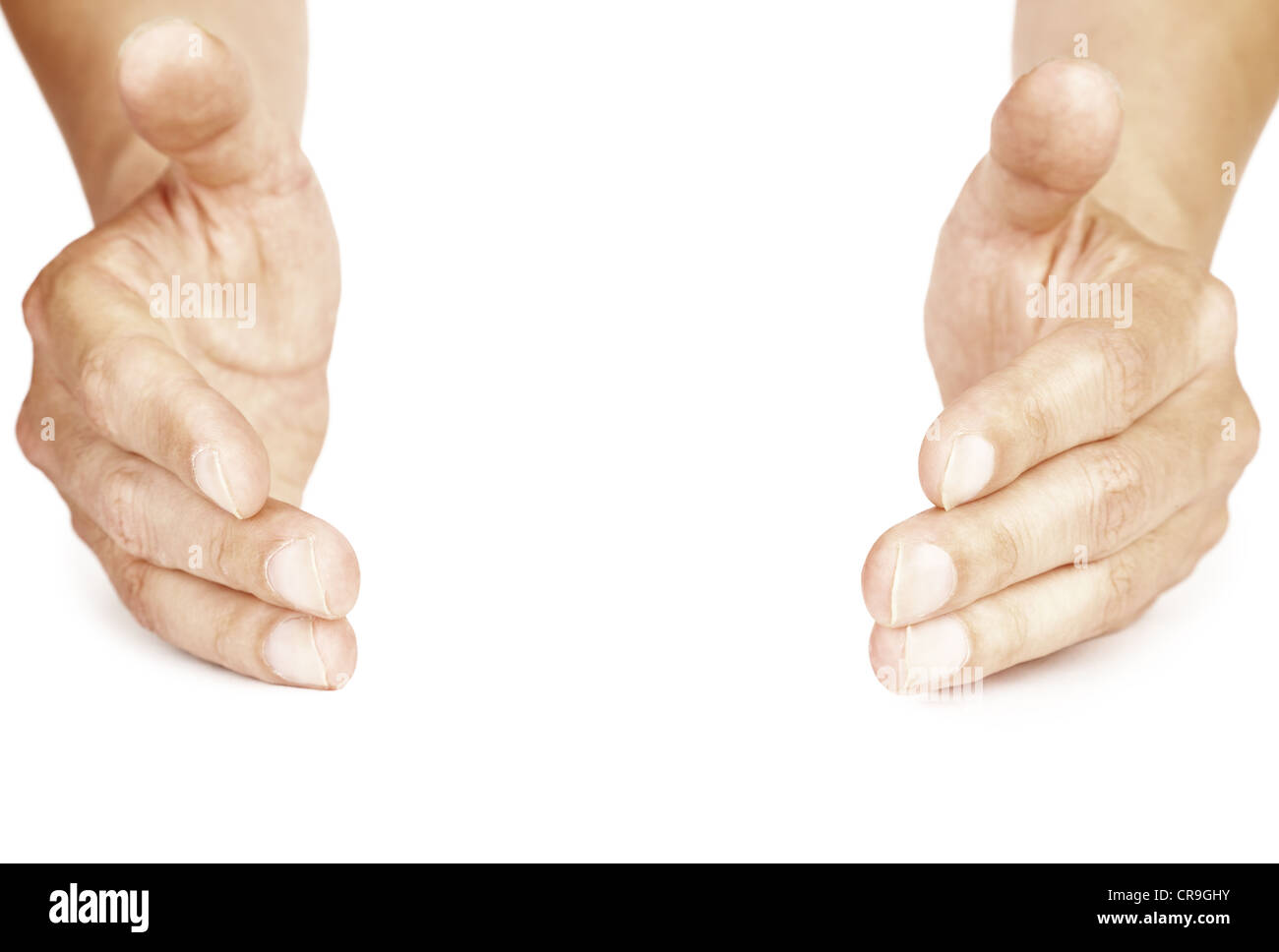 two hands in close-up isolated on white background, selective focus on ...