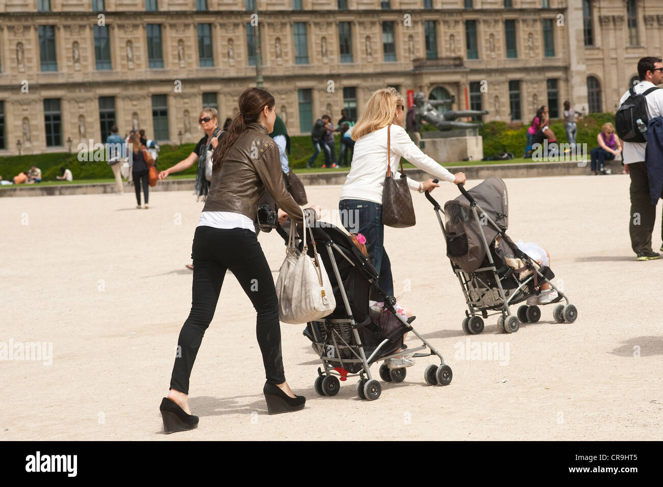Paris, France - Two young women with stroller Stock Photo - Alamy