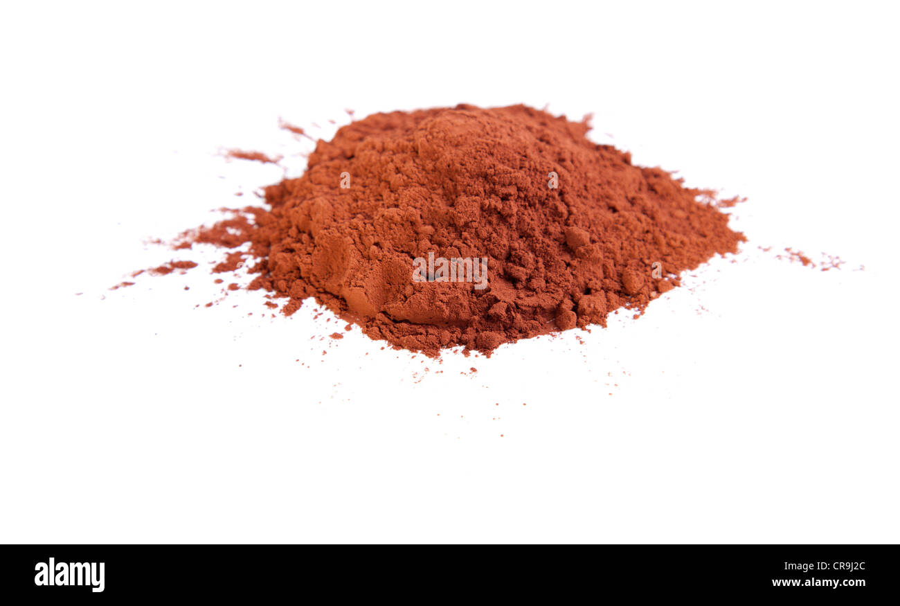 Cocoa powder on a white background Stock Photo - Alamy
