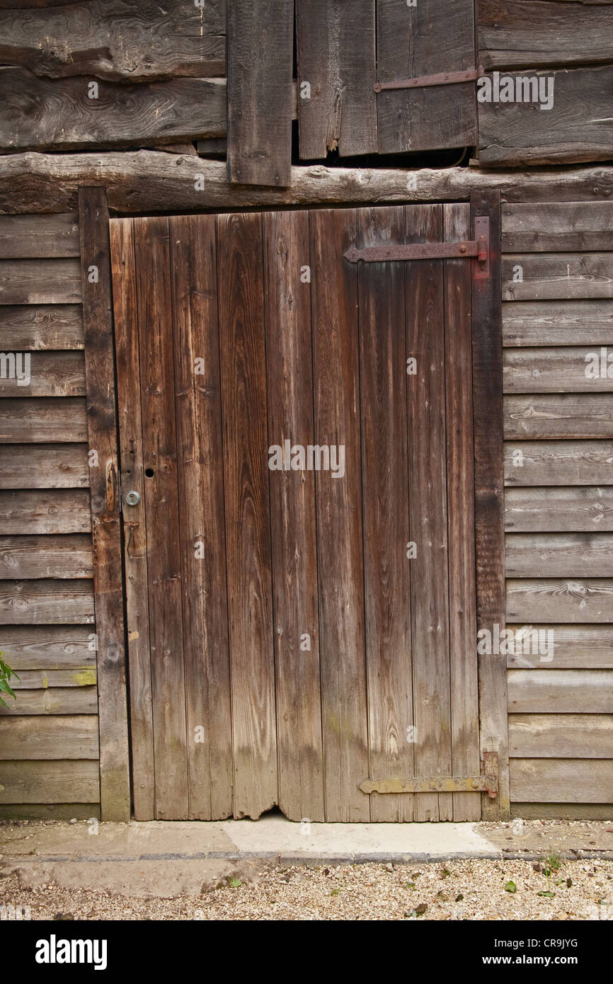 Door in old wooden building Stock Photo - Alamy