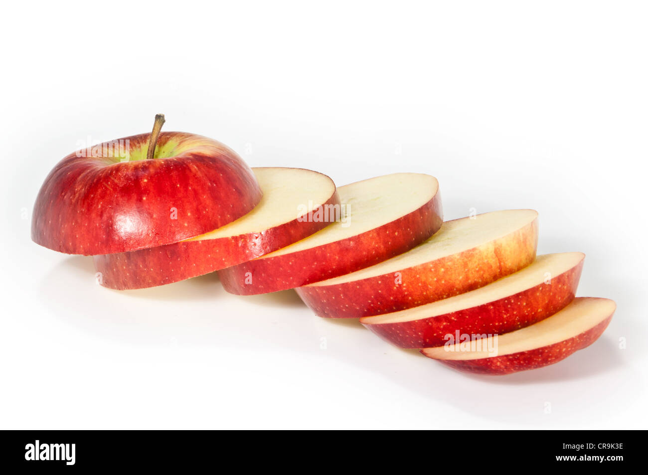 Sliced Apple isolated on white background Stock Photo - Alamy