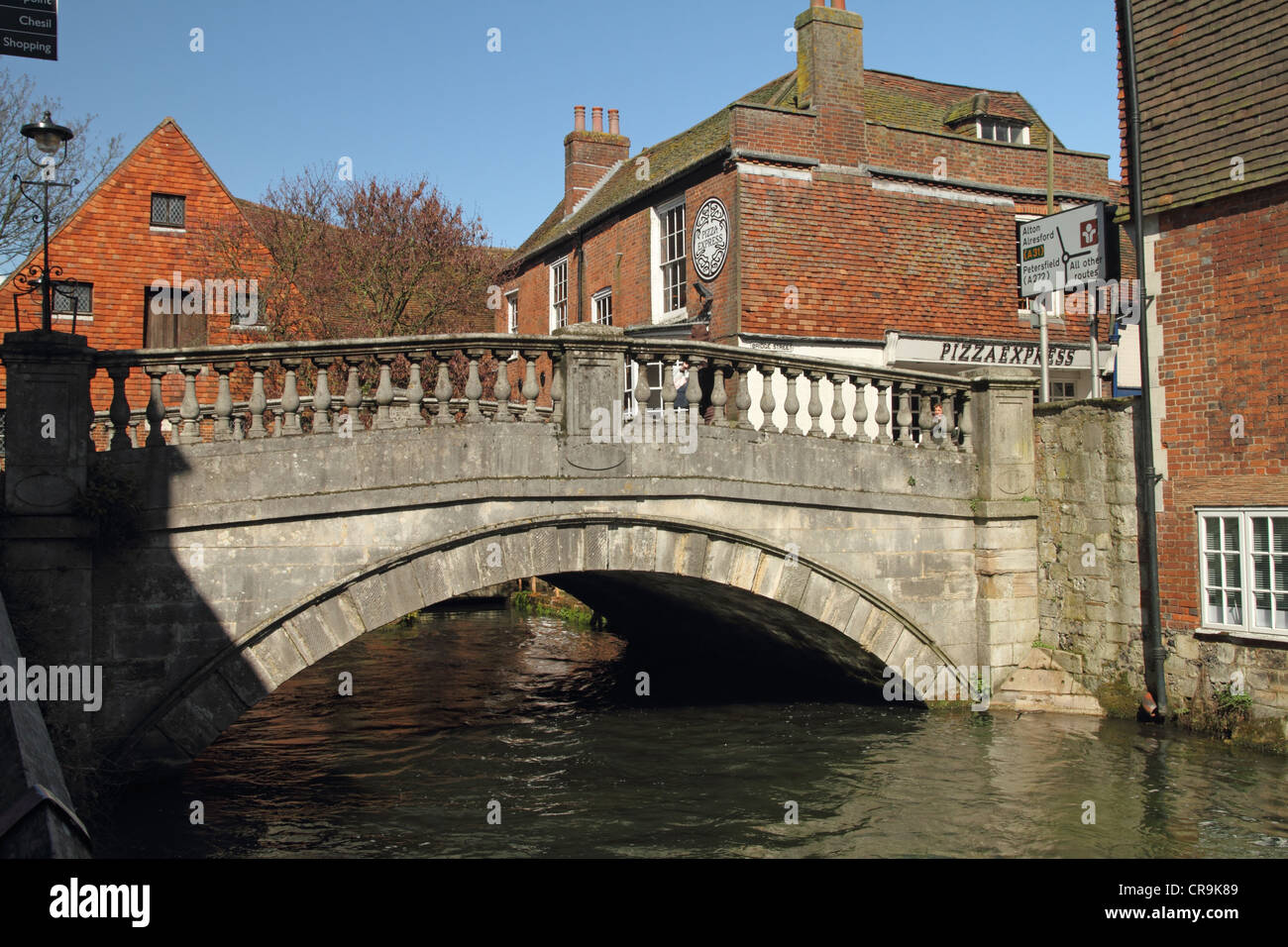 Winchester, Hampshire, England. Bridge over the River Itchen with the ...