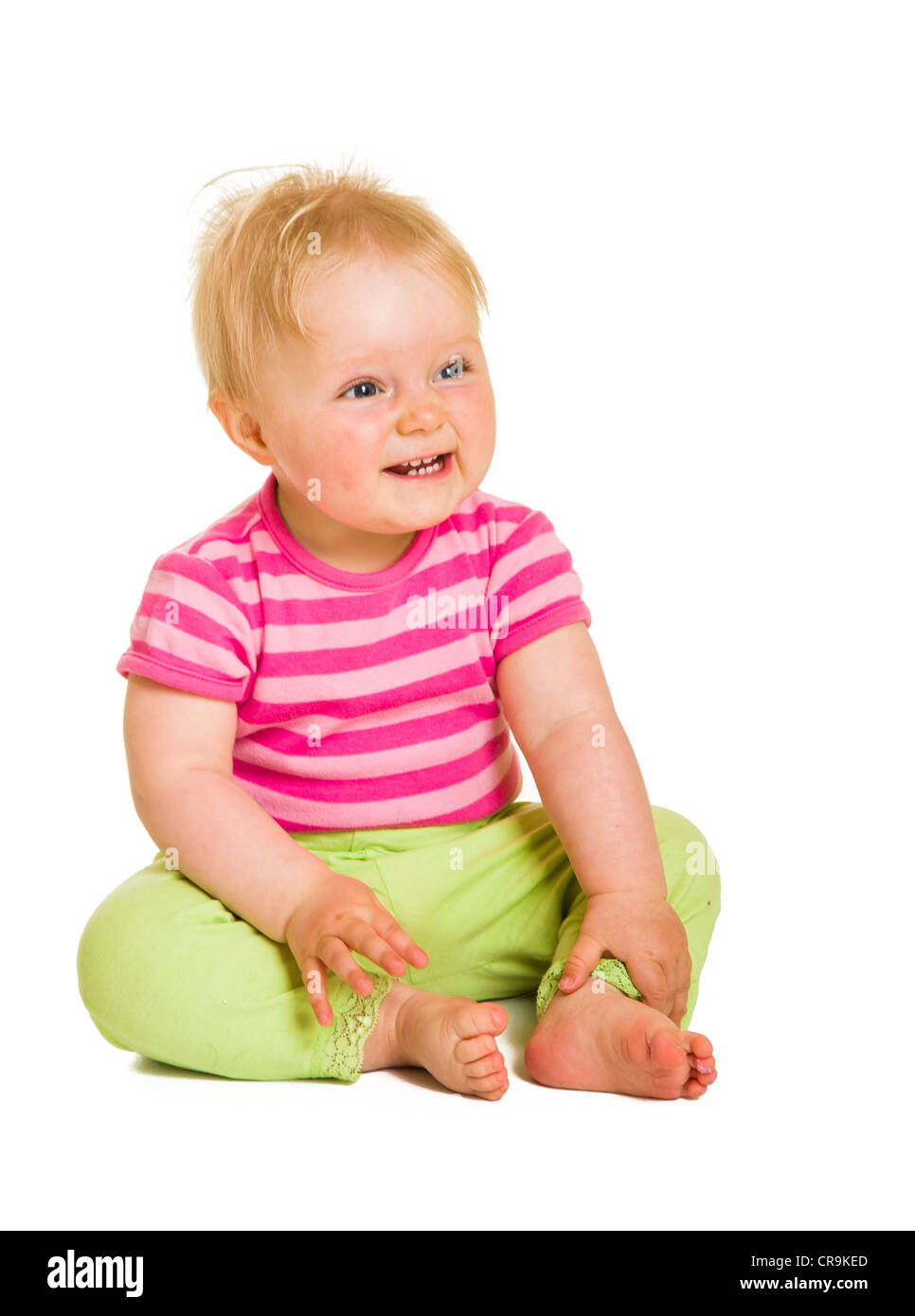 Infant baby girl in studio isolated on white Stock Photo - Alamy