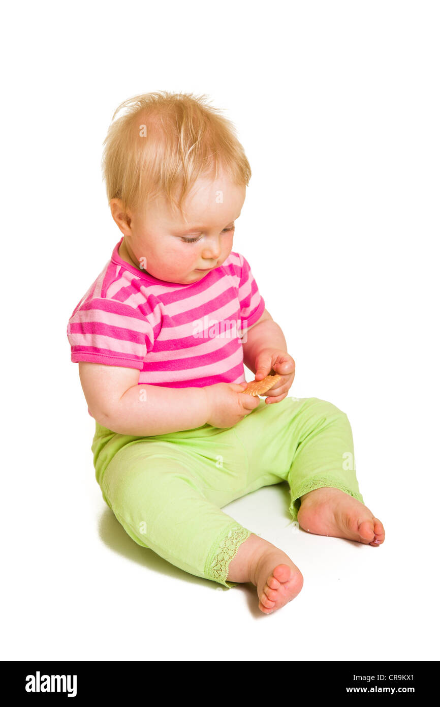 Infant baby girl in studio isolated on white Stock Photo - Alamy