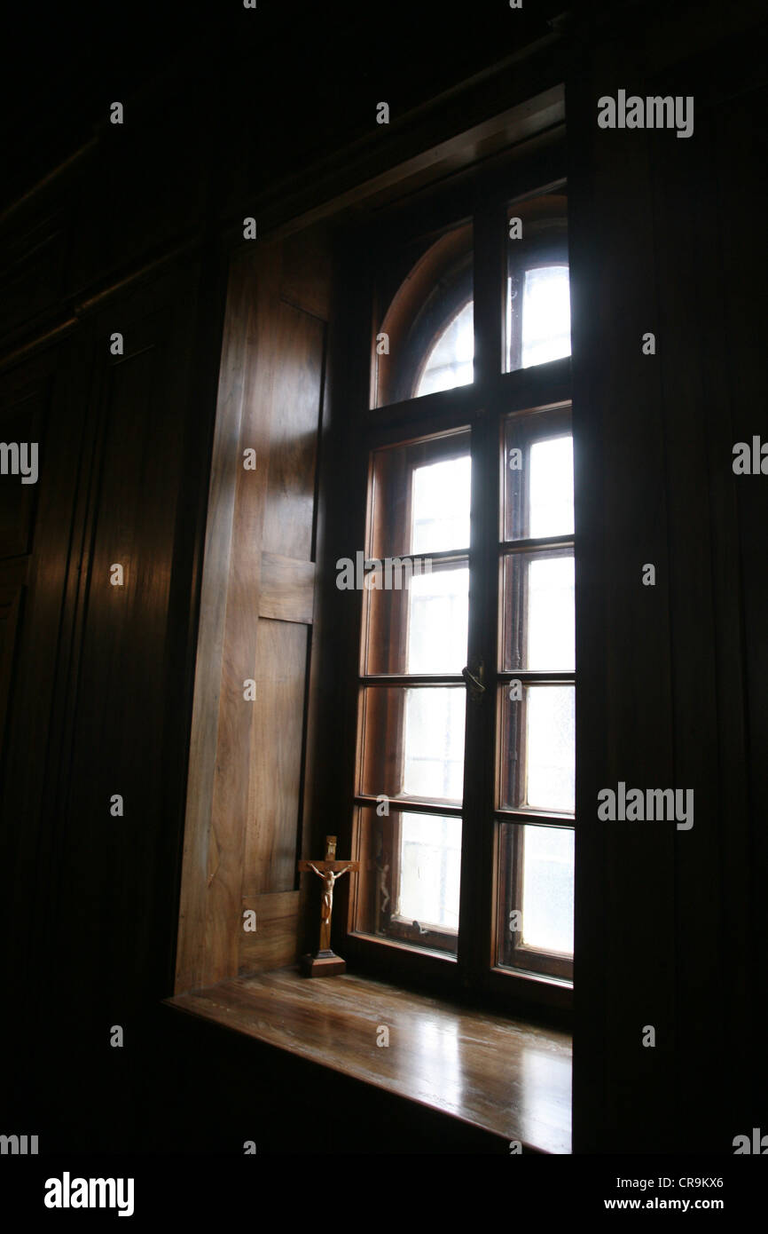 Cross at the window Stock Photo - Alamy