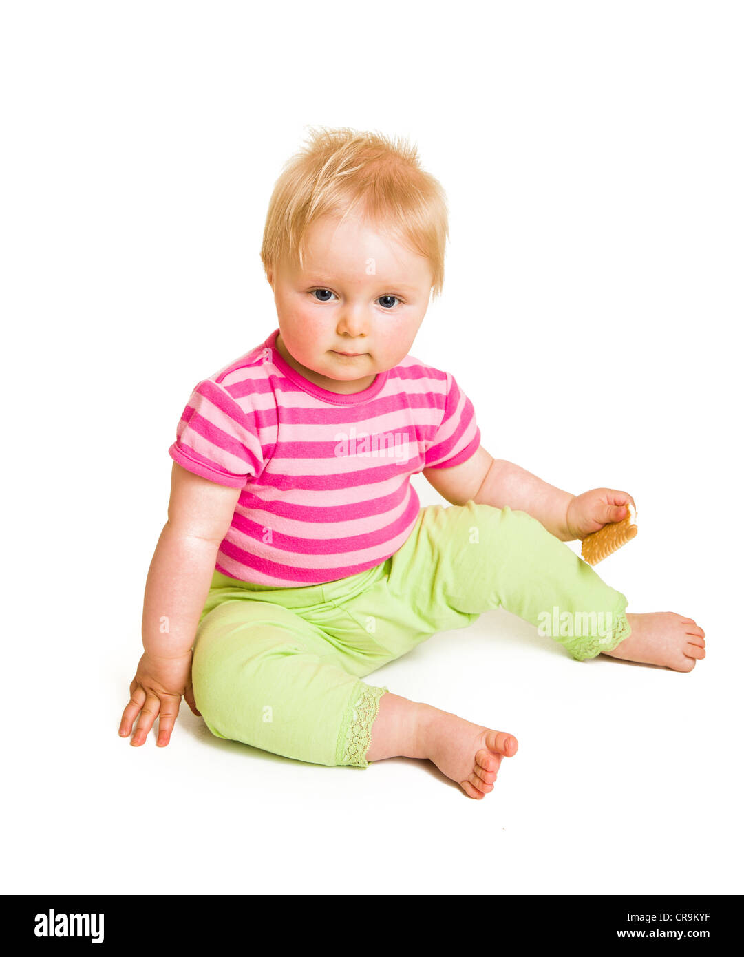Infant baby girl in studio isolated on white Stock Photo - Alamy