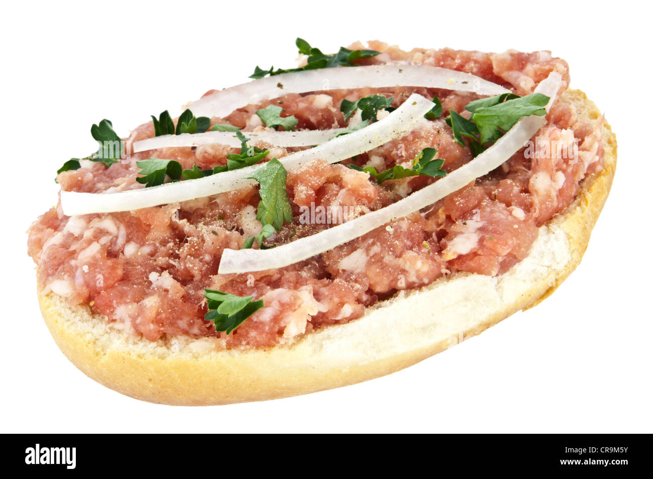 Halved roll with minced pork (In German called Mettbrötchen) isolated ...