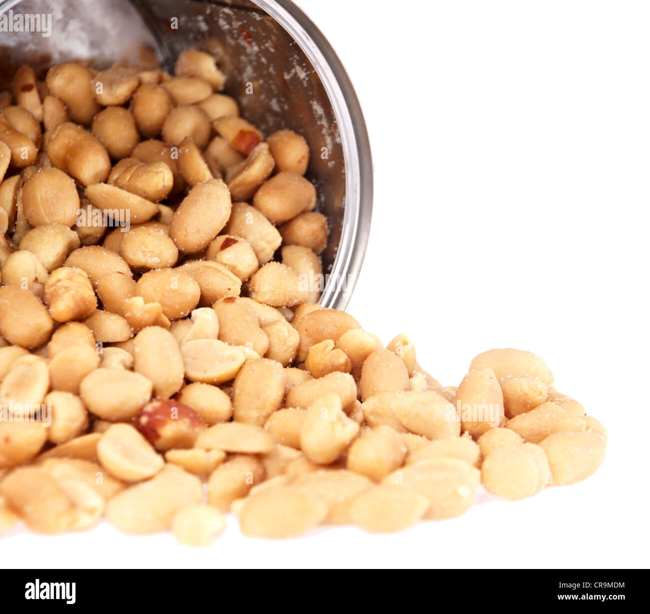 Peanuts in a can with heap in front isolated on white background Stock ...